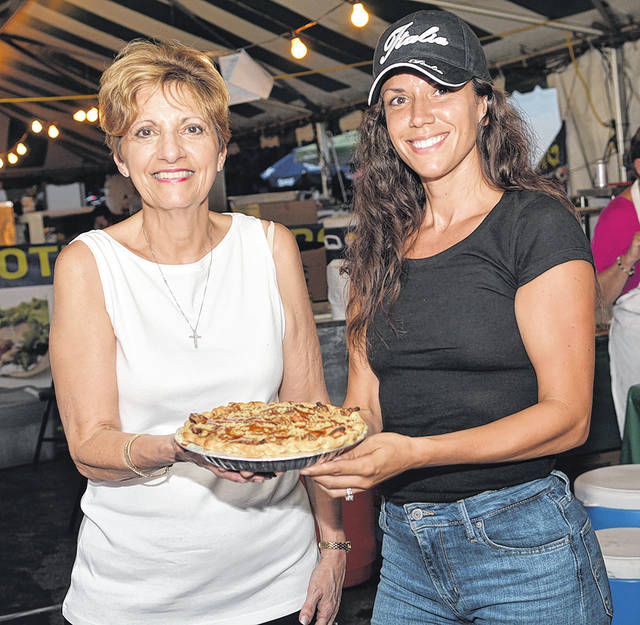 Couple stepping away from popular restaurant | The Sunday Dispatch